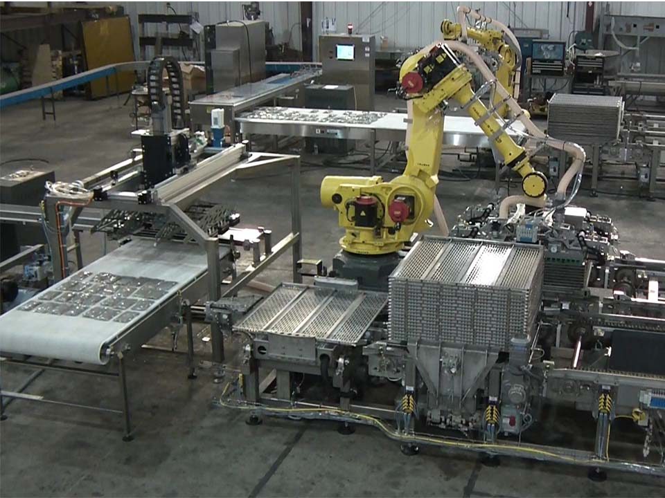 Automated Sweep Loader/Unloader for Rigid Containers | Stock America